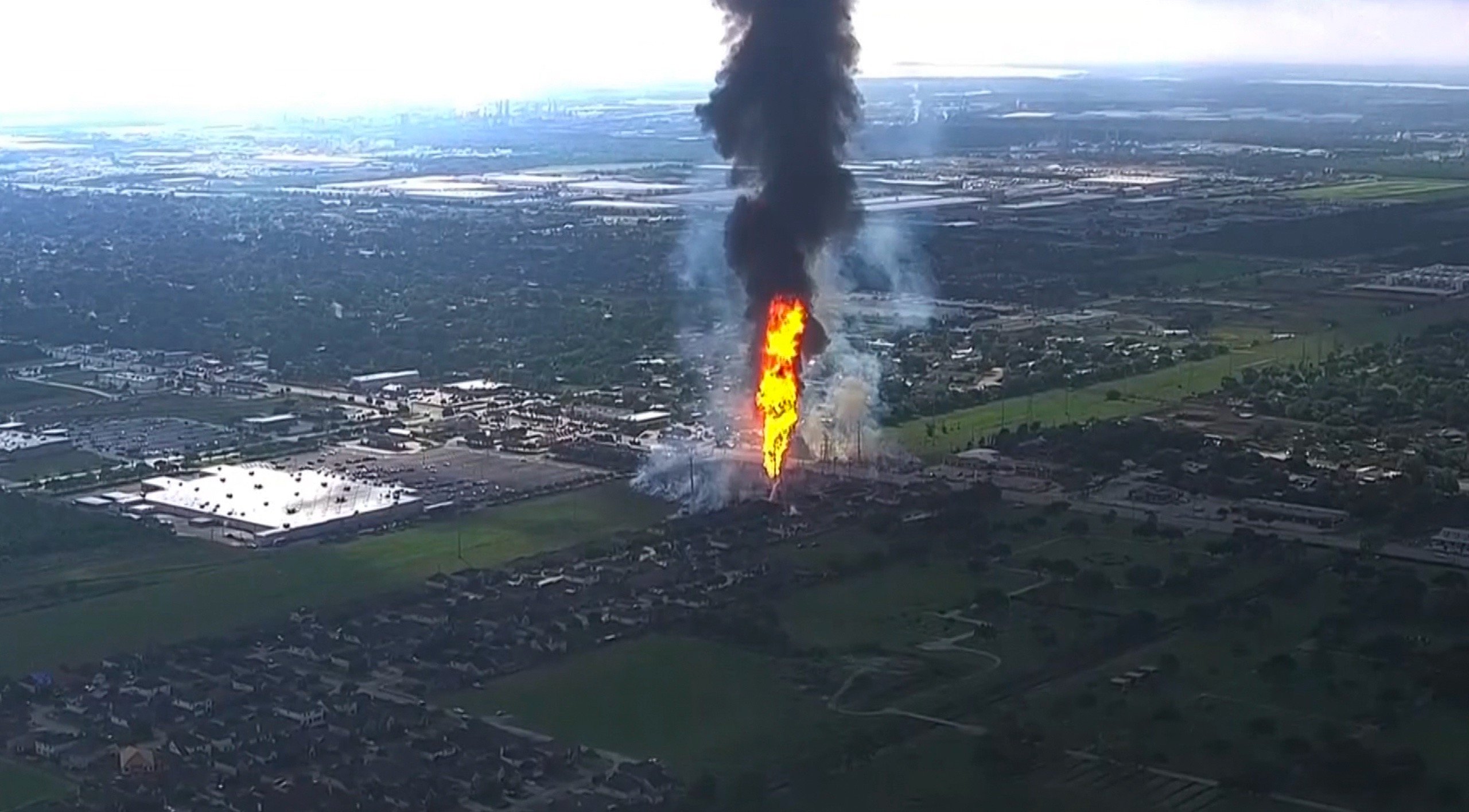 A pipeline explosion sends a towering pillar of flame over Houston’s ...
