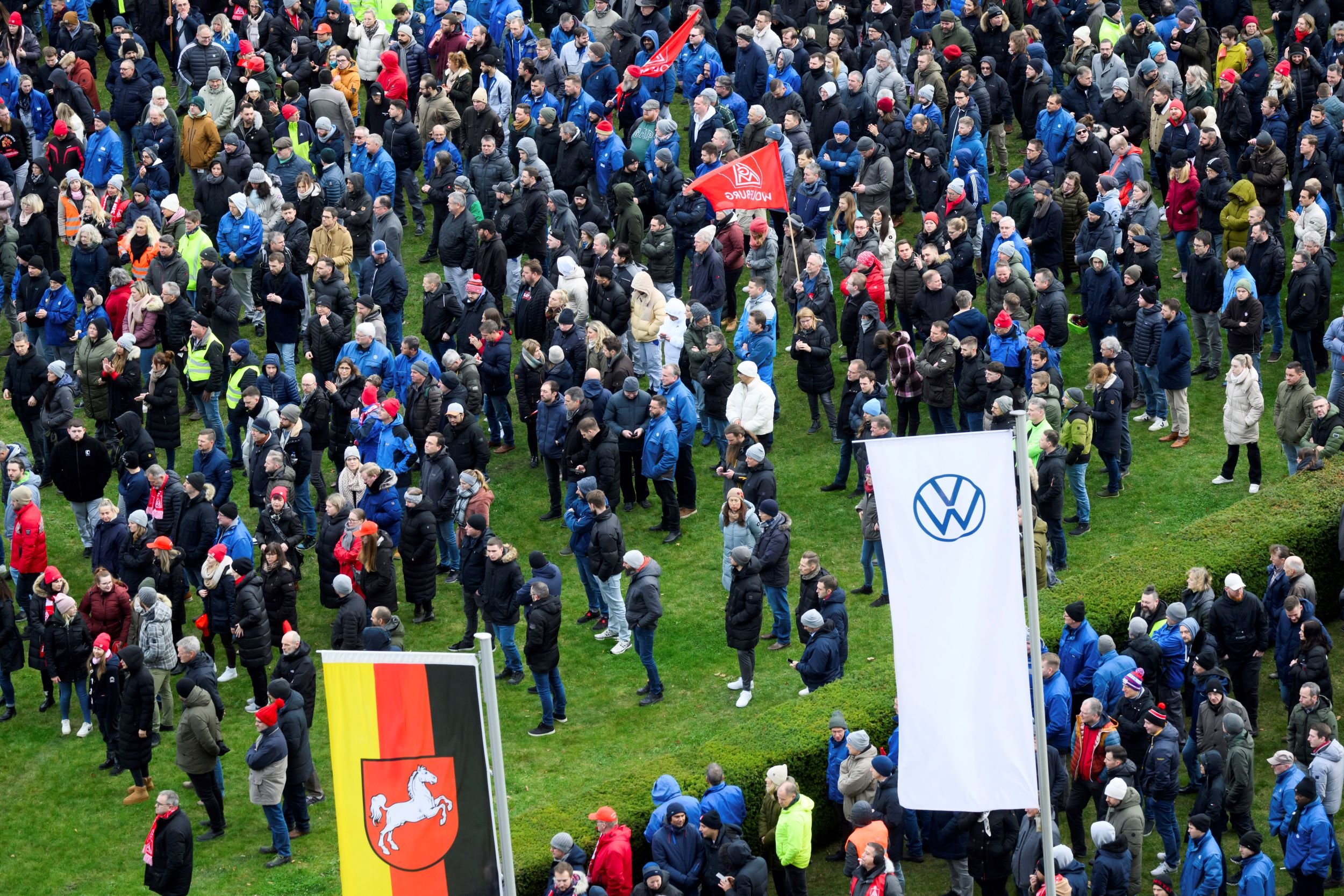 VW workers threaten more strikes as German automaker stumbles over EVs ...
